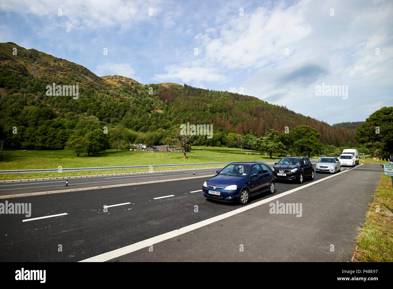 cars parked in a lay-by of the A66 on Bassenthwaite lake at blackstock ...