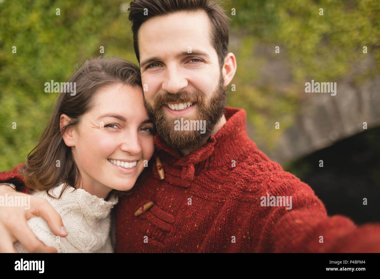 Happy couple embracing each other Stock Photo - Alamy