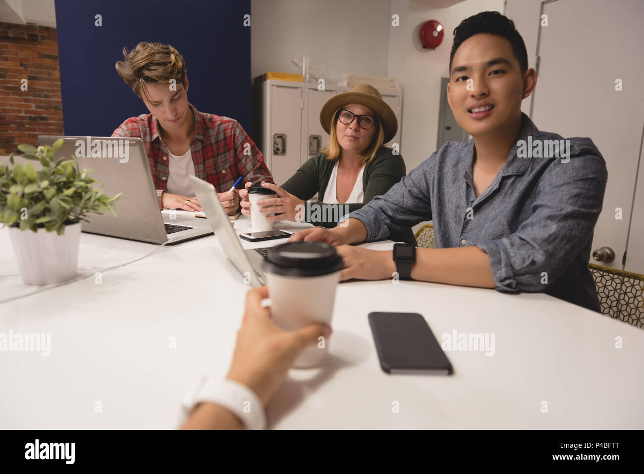 Executives having a meeting in an office Stock Photo - Alamy Executives having a meeting in an office Stock Photo - Alamy