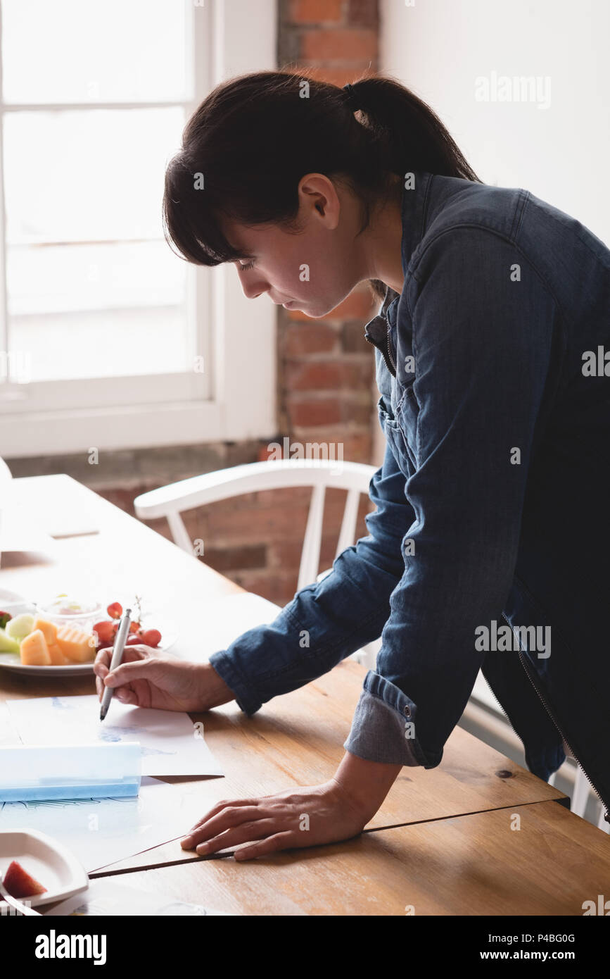 Checking documents hi-res stock photography and images - Alamy