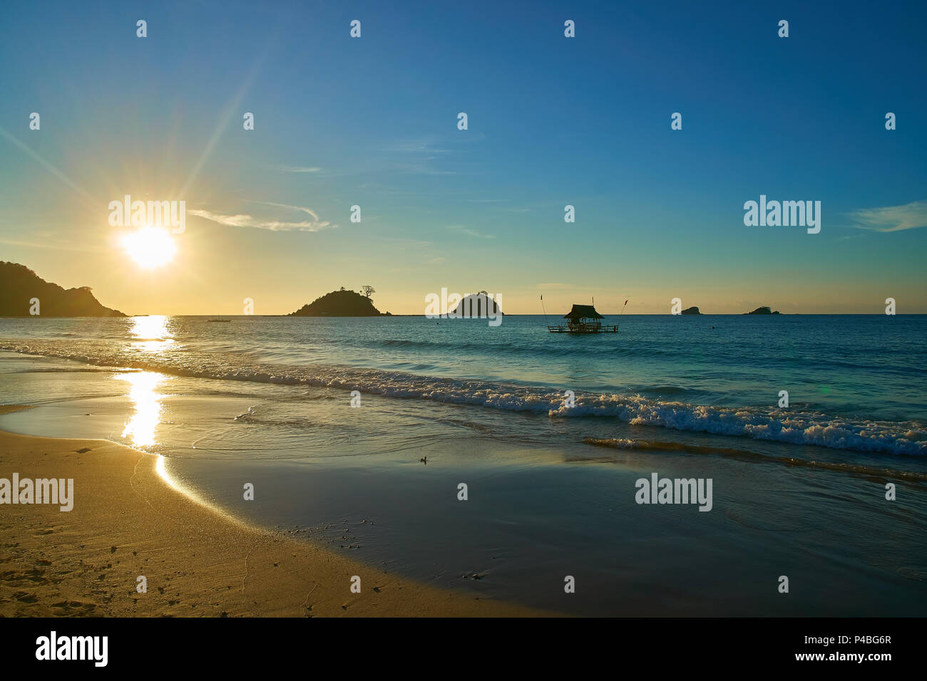 Boat view on the beach Stock Photo - Alamy