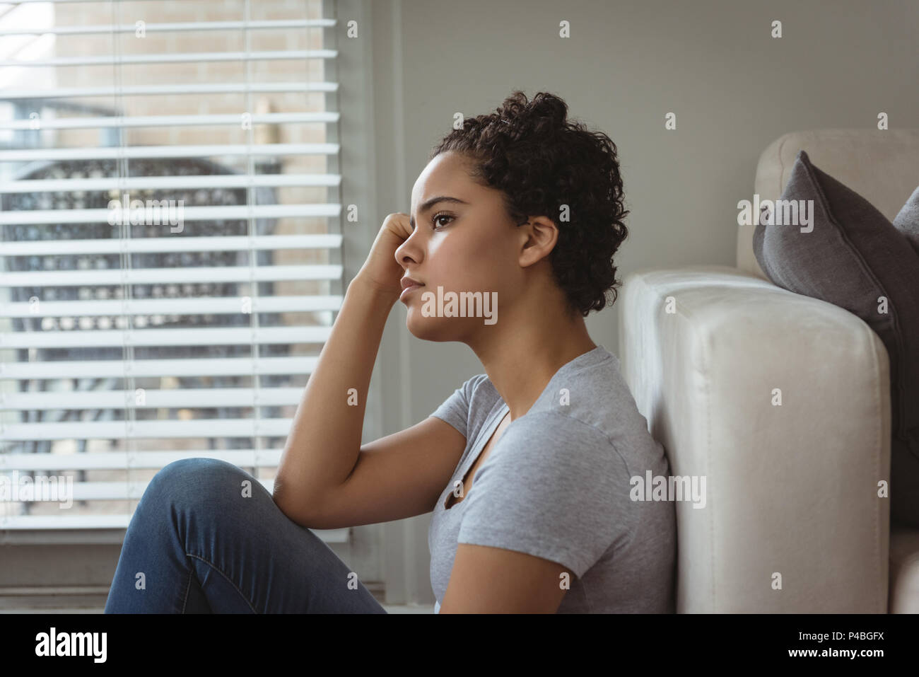 Woman sitting luxury home hi-res stock photography and images - Alamy