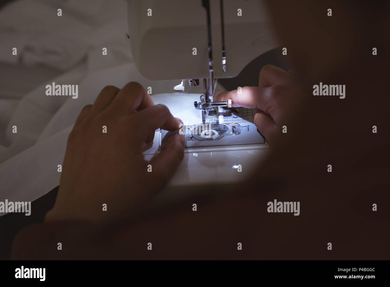 Hands sewing machine hi-res stock photography and images - Alamy