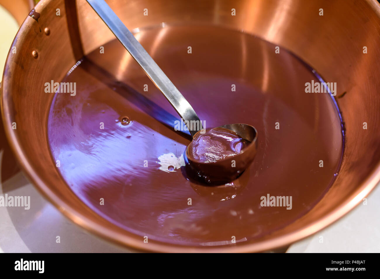 Chocolate preparation - making chocolate in the kitchen Stock Photo - Alamy