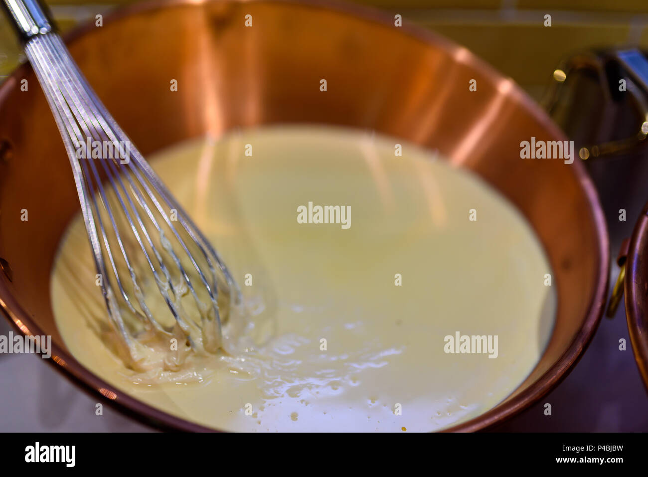 Chocolate preparation - making chocolate in the kitchen Stock Photo - Alamy