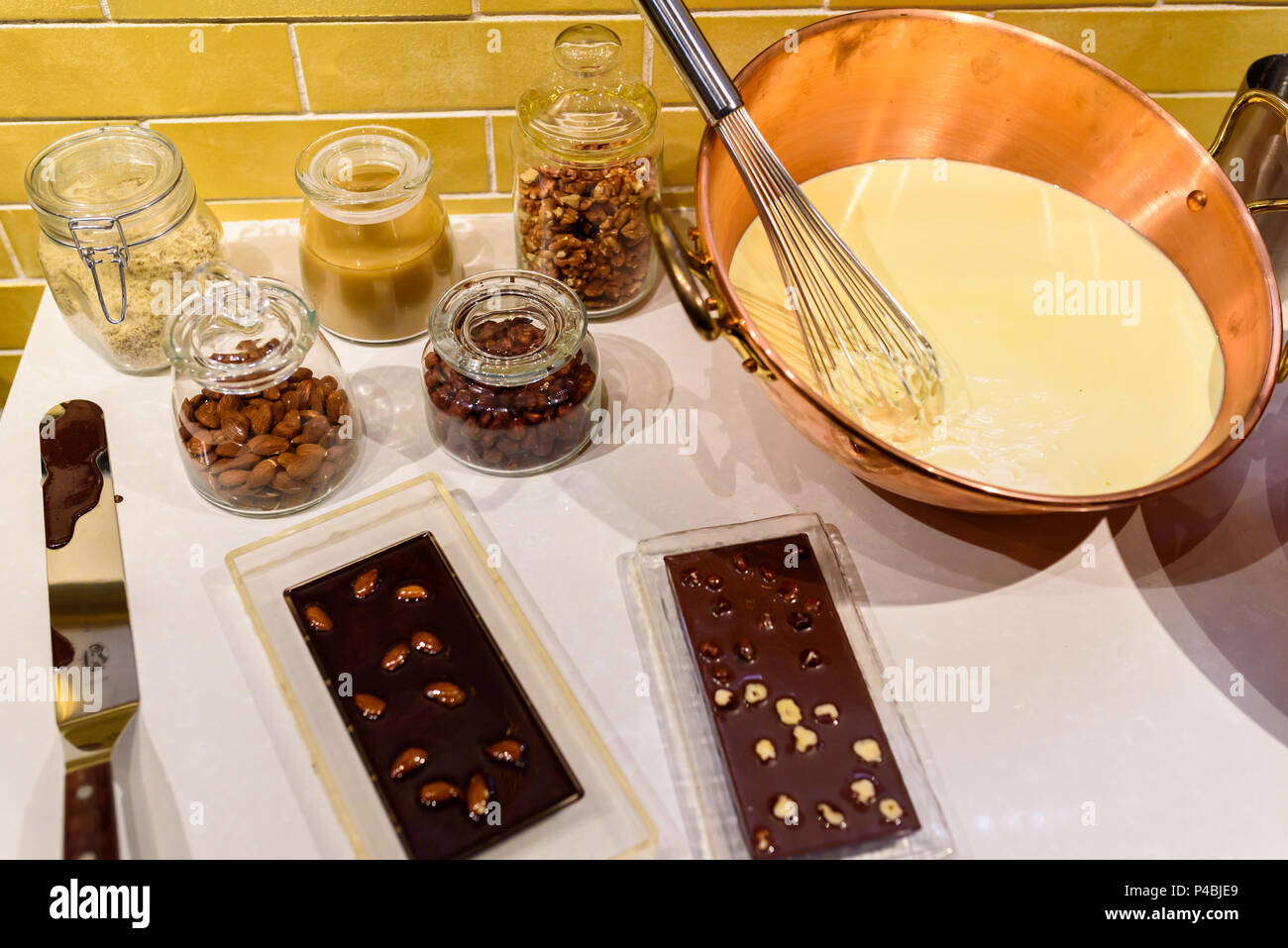 Chocolate preparation - making chocolate in the kitchen Stock Photo - Alamy