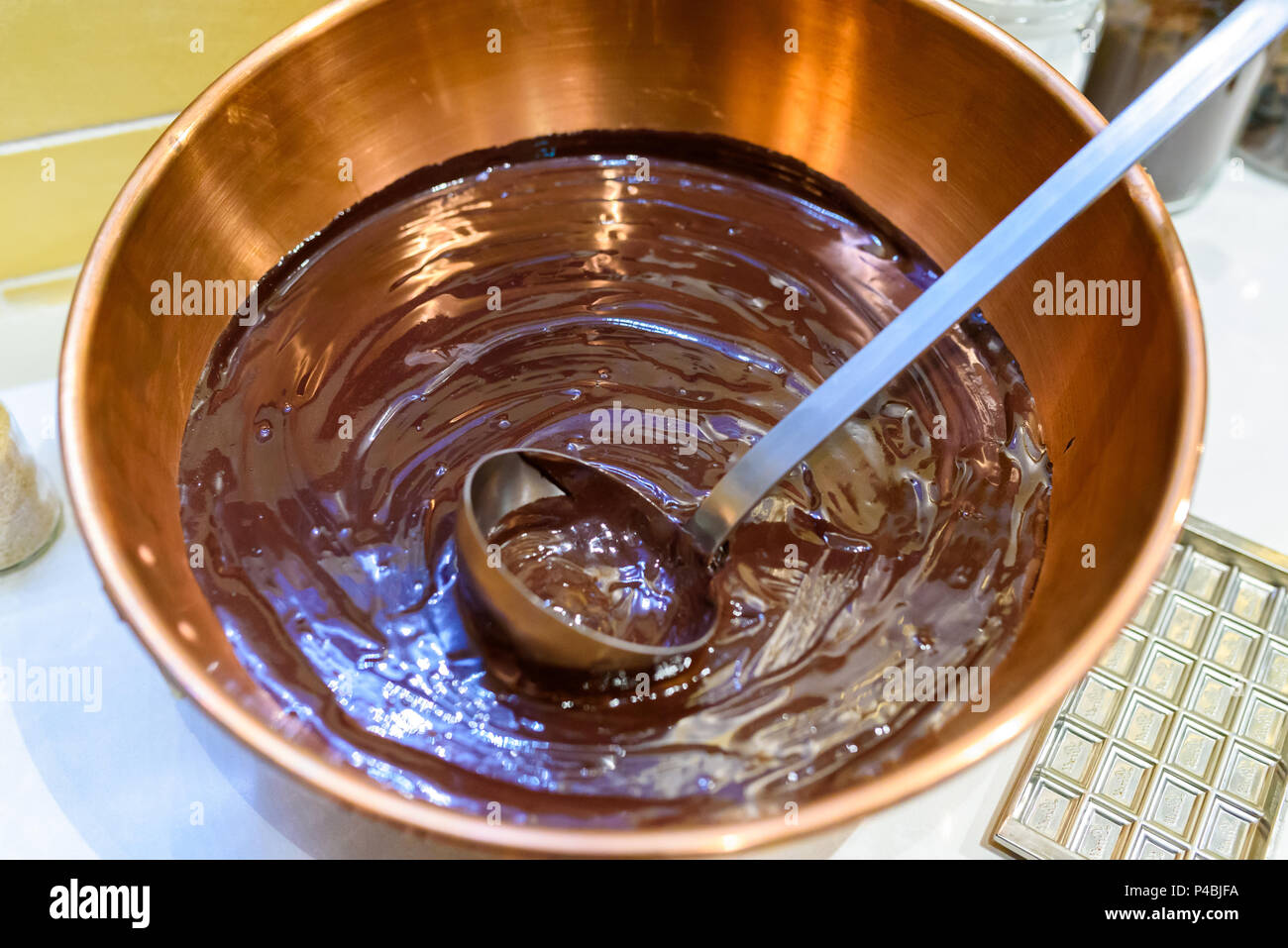 Chocolate preparation - making chocolate in the kitchen Stock Photo - Alamy