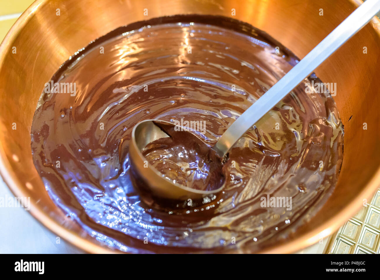 Chocolate preparation - making chocolate in the kitchen Stock Photo - Alamy