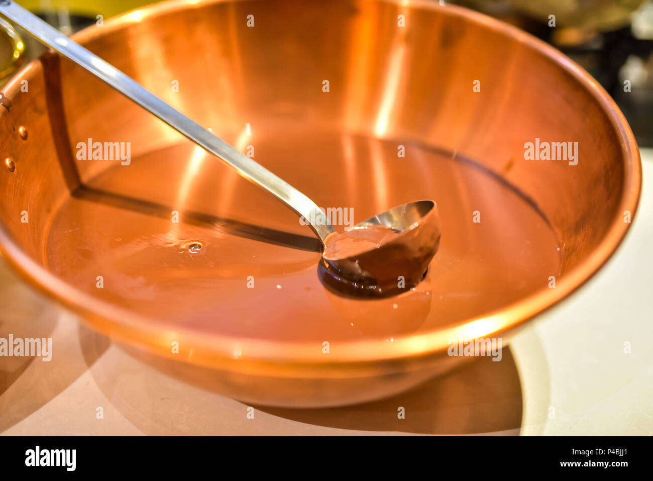 Chocolate preparation - making chocolate in the kitchen Stock Photo - Alamy