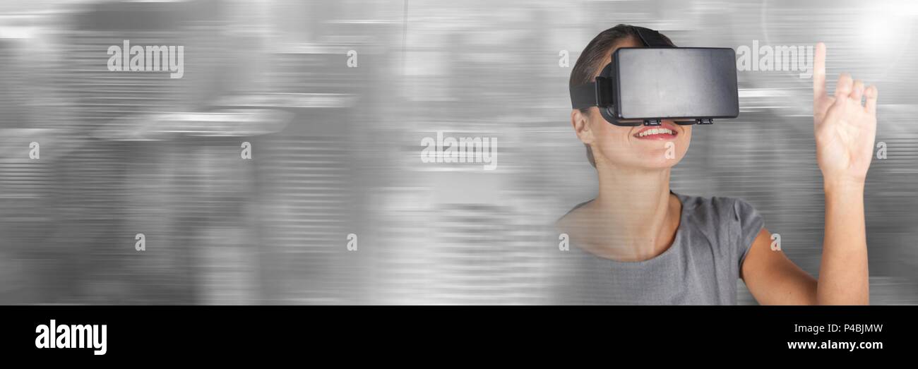 Woman wearing virtual reality headset glasses with motion effects ...