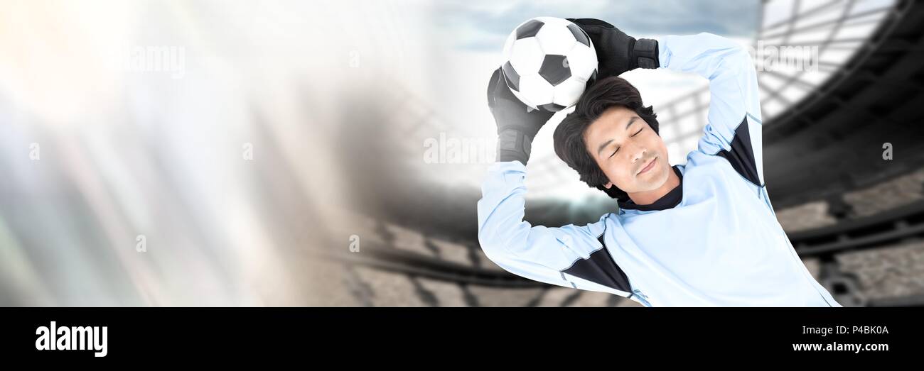 Soccer goalkeeper saving ball in goal with transition Stock Photo - Alamy