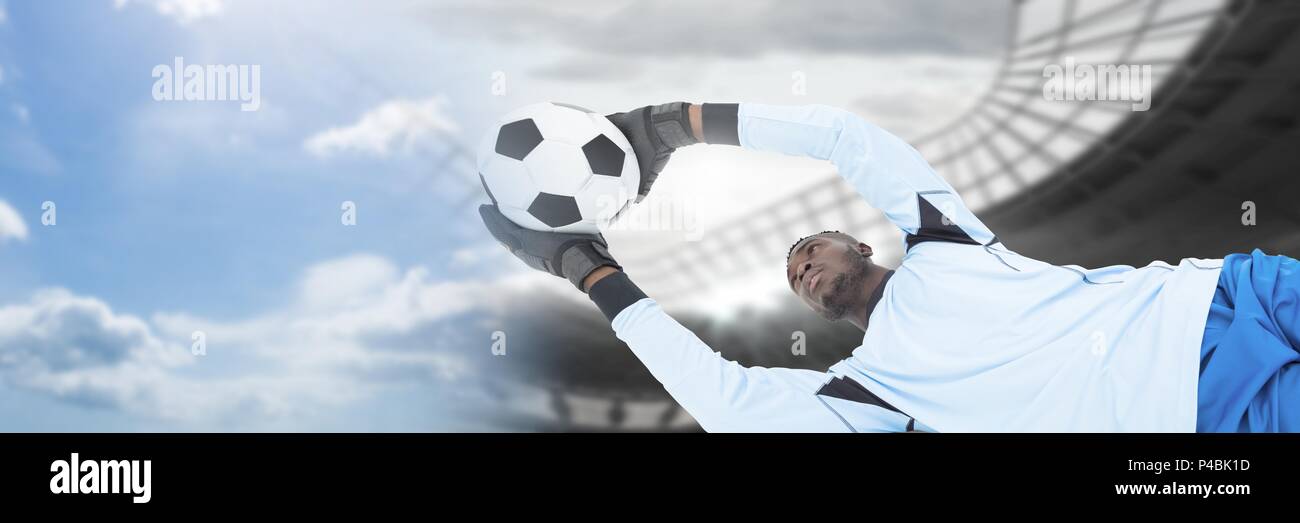 Soccer goalkeeper saving football with transition Stock Photo - Alamy