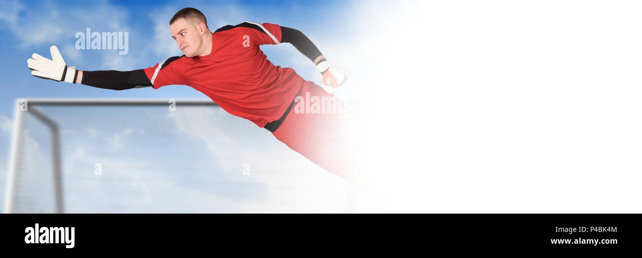 Soccer goalkeeper saving in goal with transition Stock Photo - Alamy