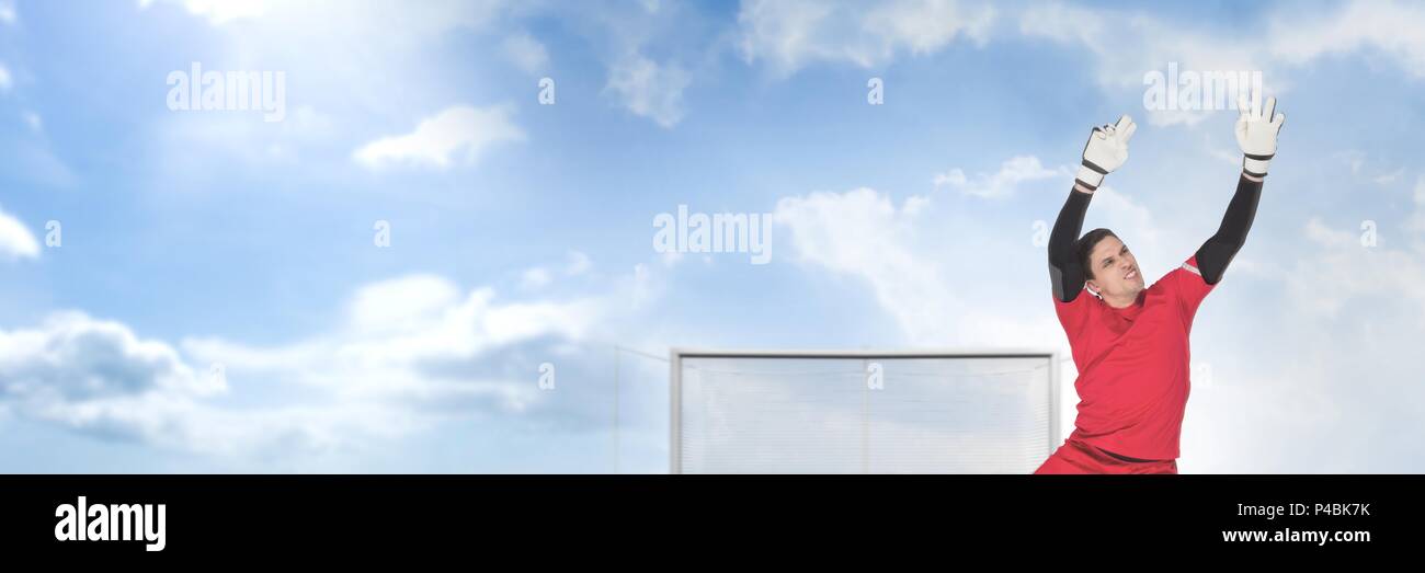 Soccer goalkeeper saving in goal with transition Stock Photo - Alamy