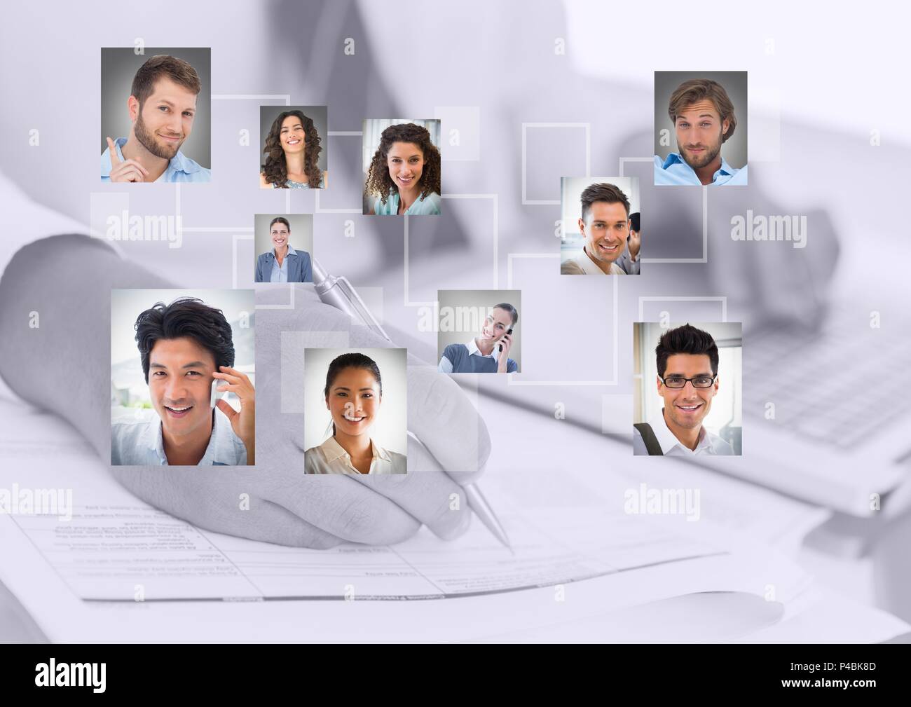 Composite image of businessperson writing with portraits picture Stock ...