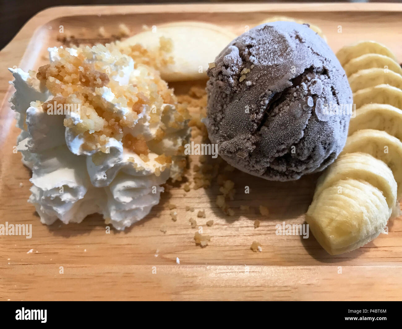 Chocolate ice cream one scoop with fruit topping in the cafe Stock ...