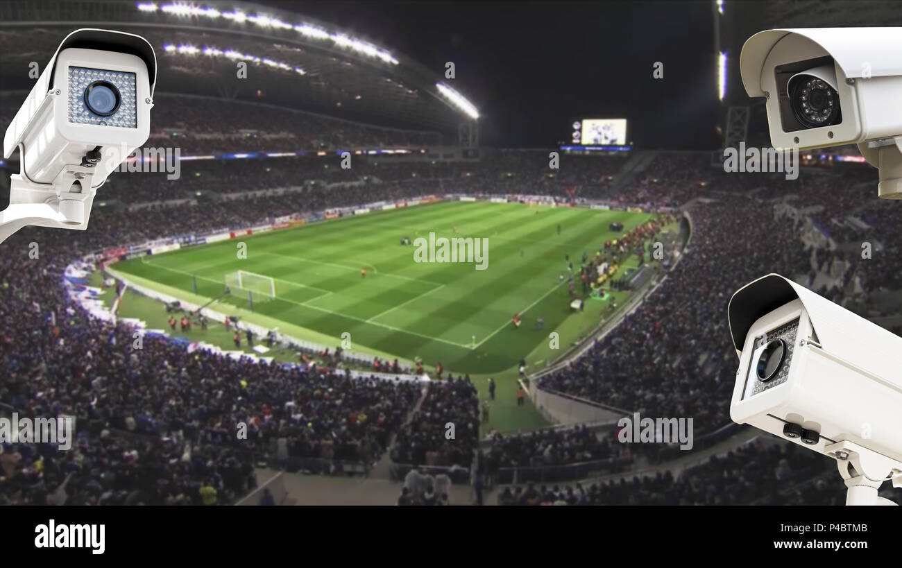 The CCTV Security Camera operating in football stadium at night time ...