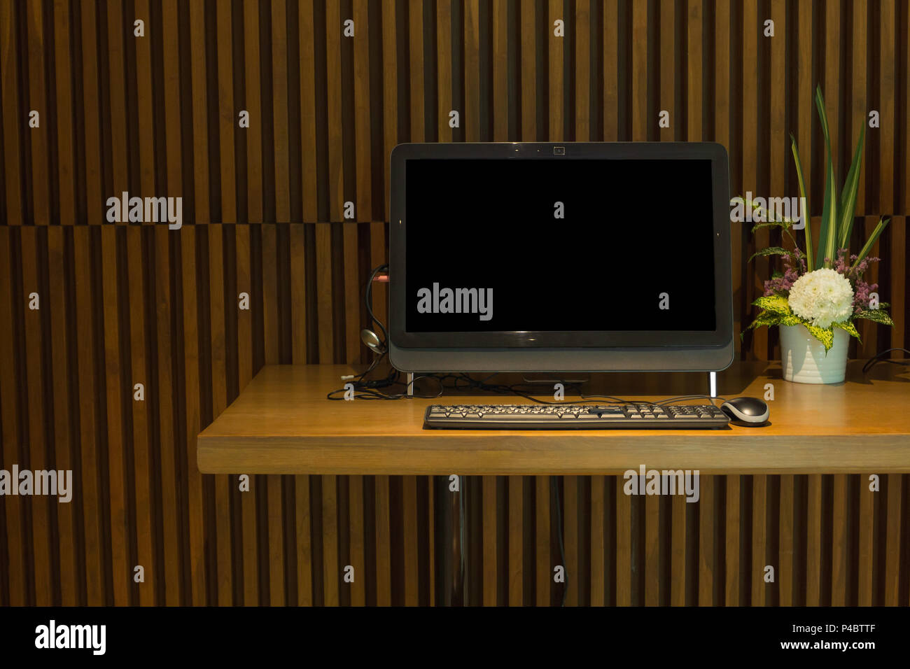 Black pc computer on modern wood table in the luxury cafe Stock Photo ...