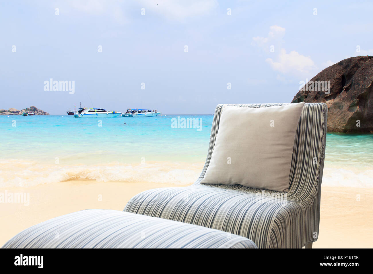 Modern sofa on beautiful sky and sea background Stock Photo - Alamy
