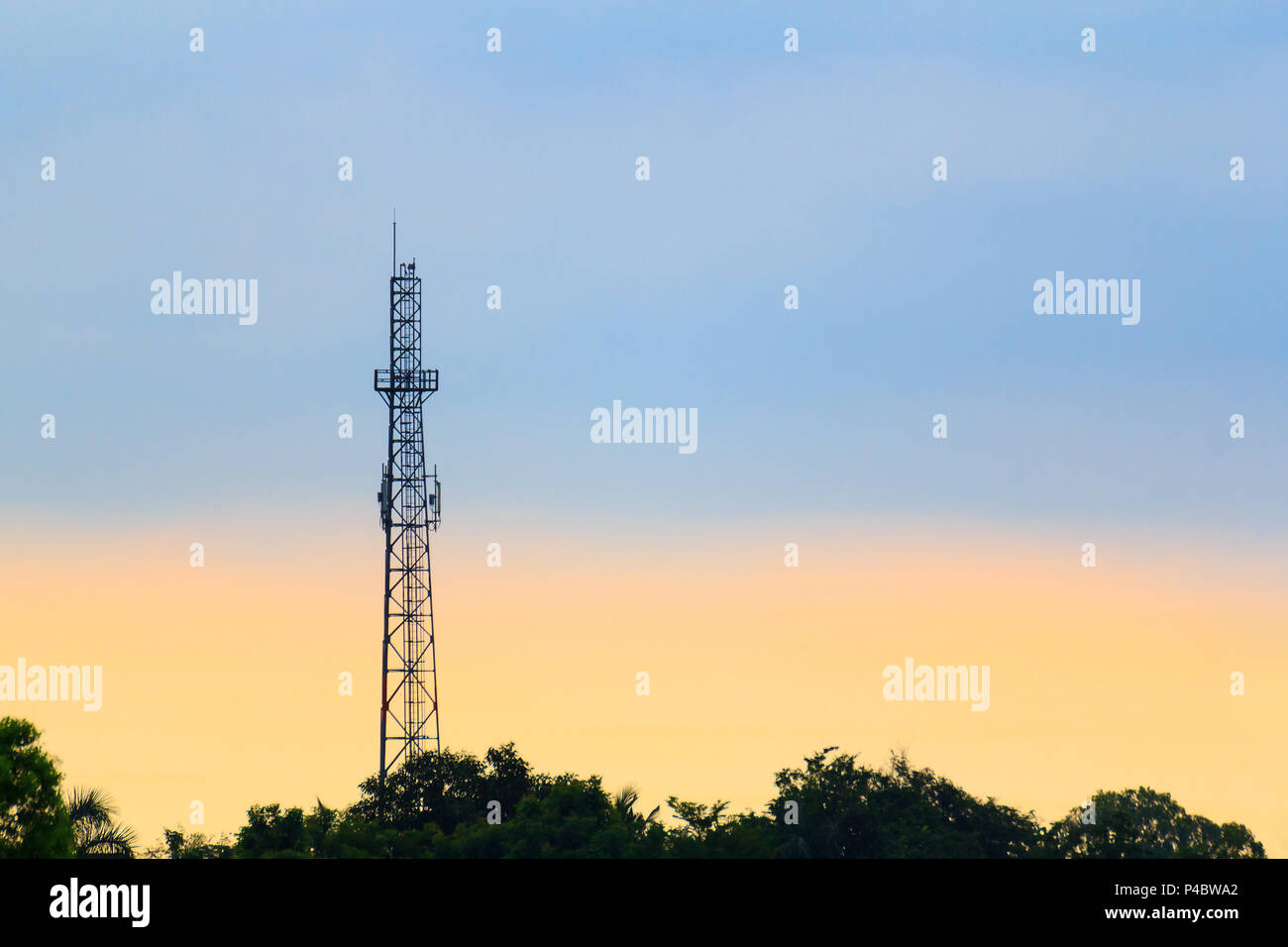 The communication tower with beautiful sky background Stock Photo - Alamy