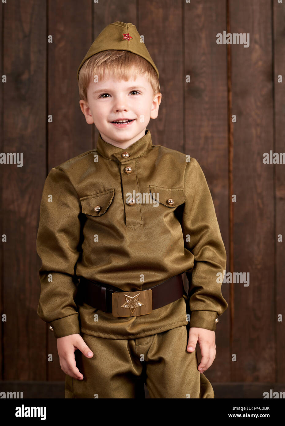 children are dressed as soldier in retro military uniforms Stock Photo ...