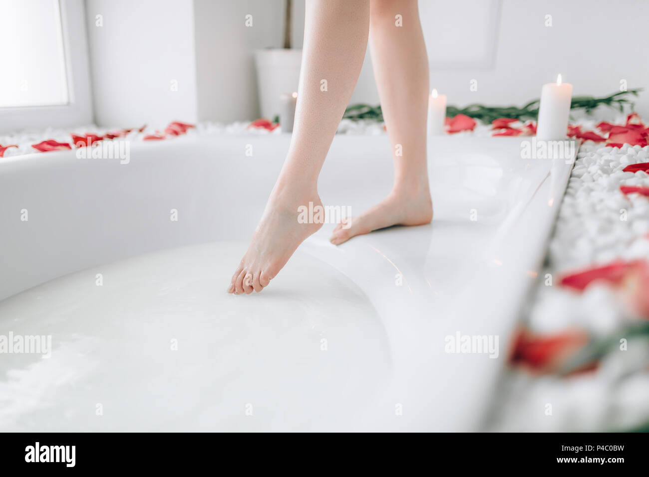 Woman in bath legs hi-res stock photography and images - Alamy