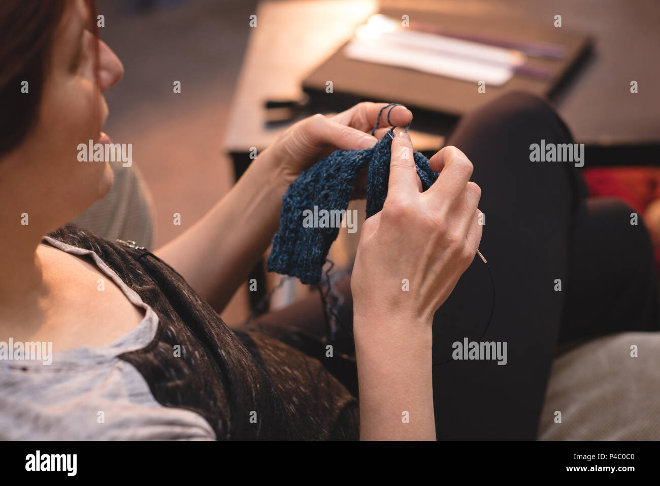 Woman knitting wool at tailor shop Stock Photo - Alamy