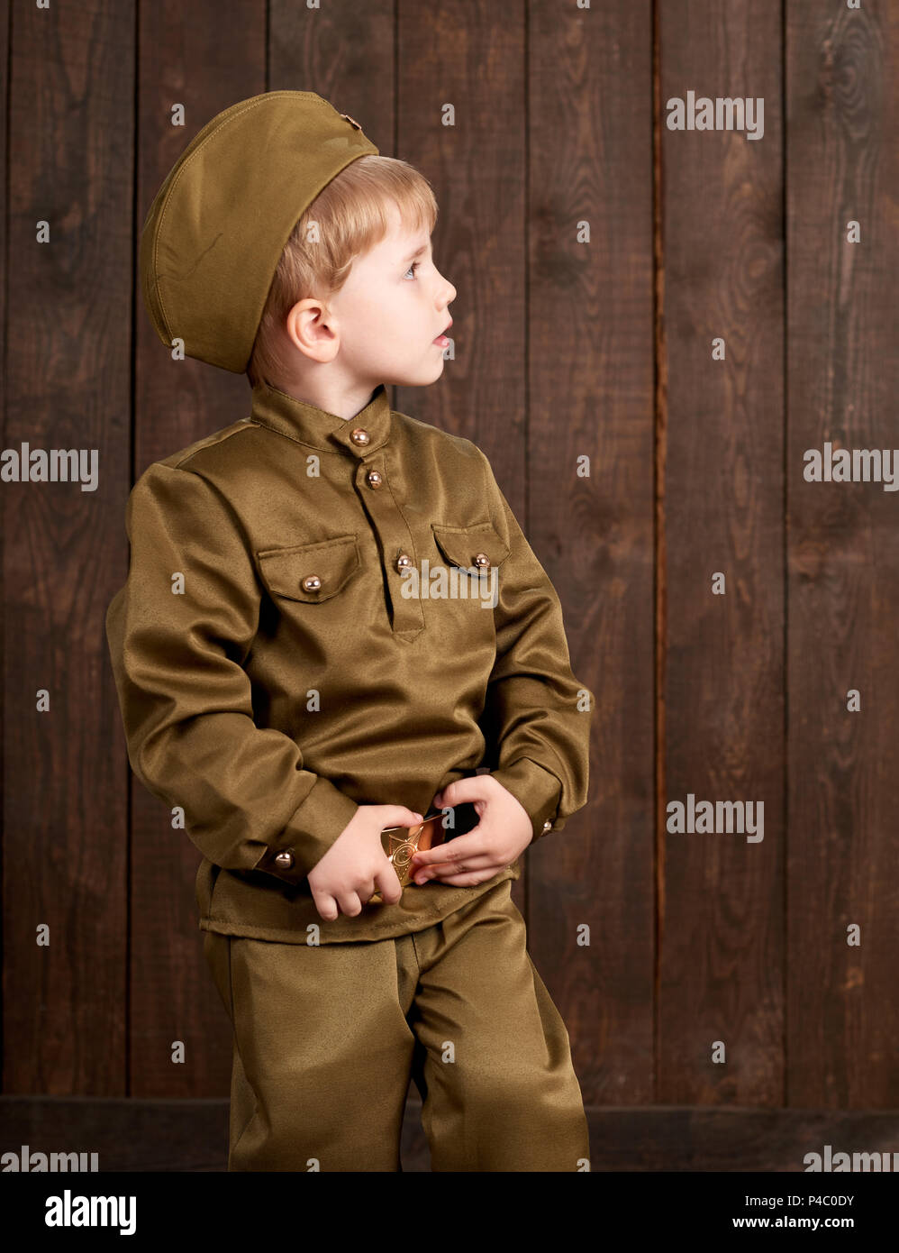 children are dressed as soldier in retro military uniforms Stock Photo ...