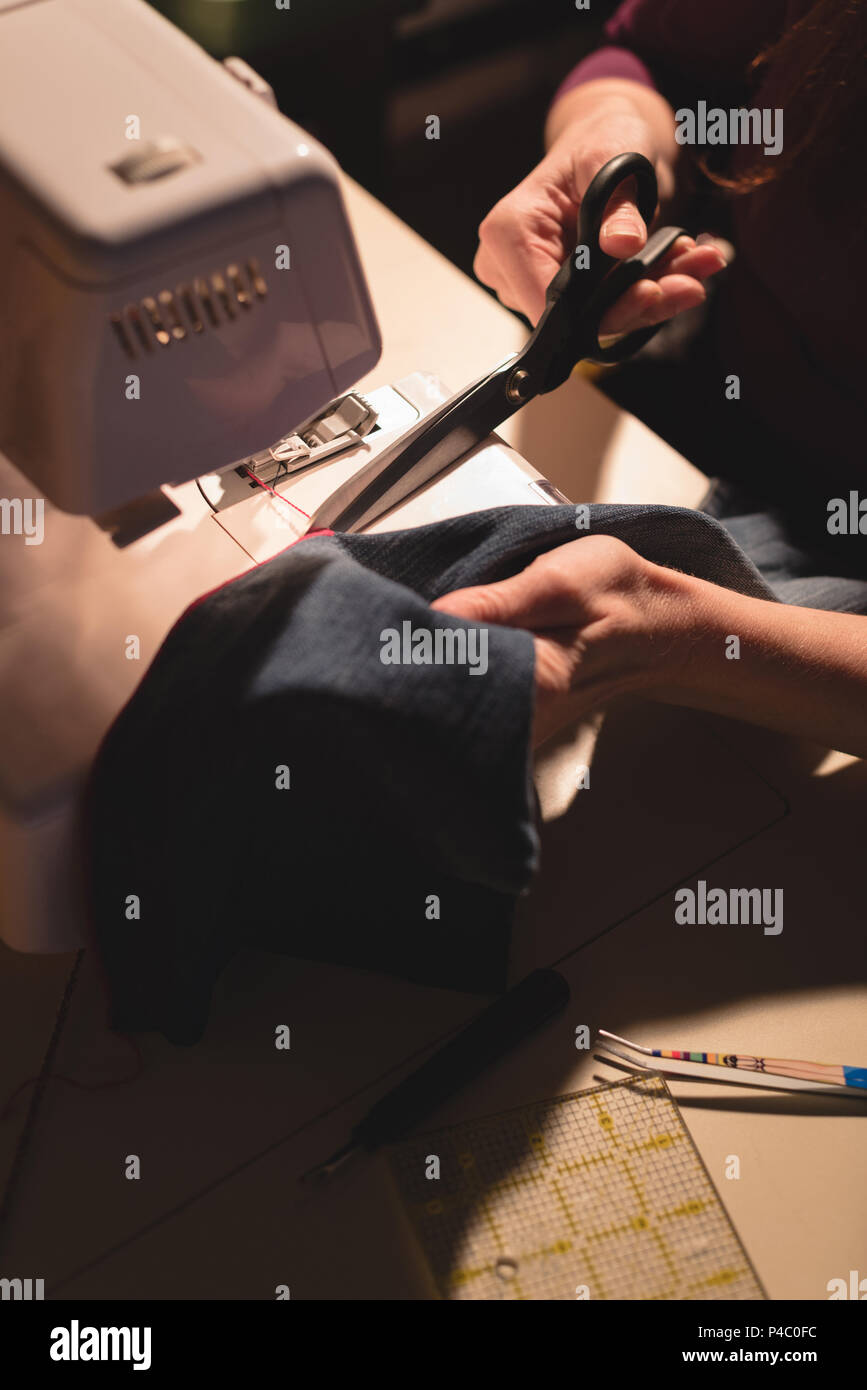 Mature woman sewing designer hi-res stock photography and images - Alamy