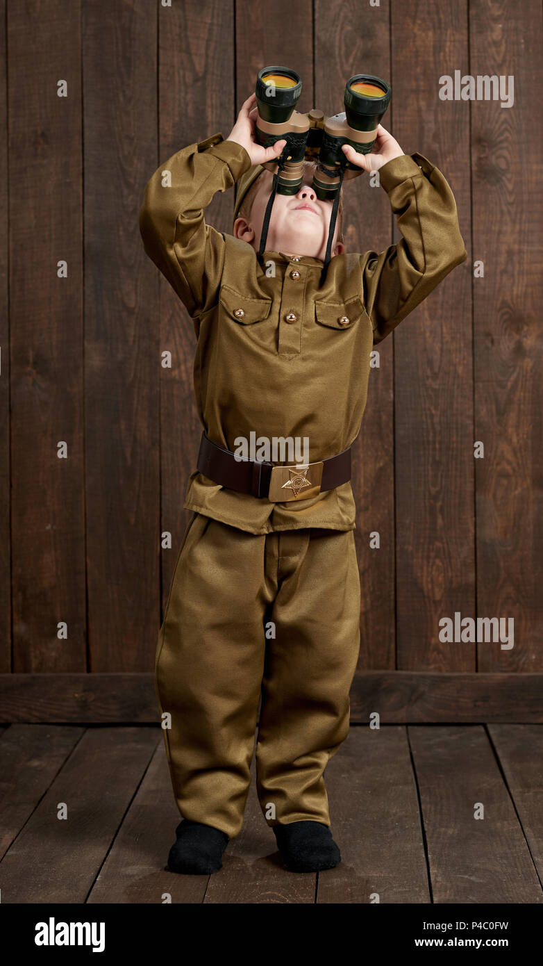 children are dressed as soldier in retro military uniforms Stock Photo ...