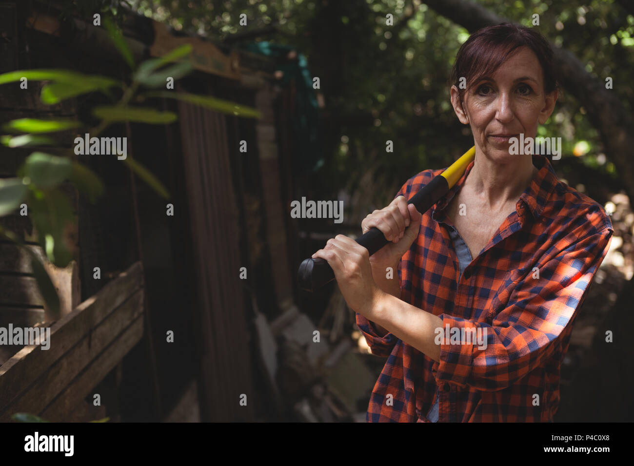 Woman with an axe hi-res stock photography and images - Alamy