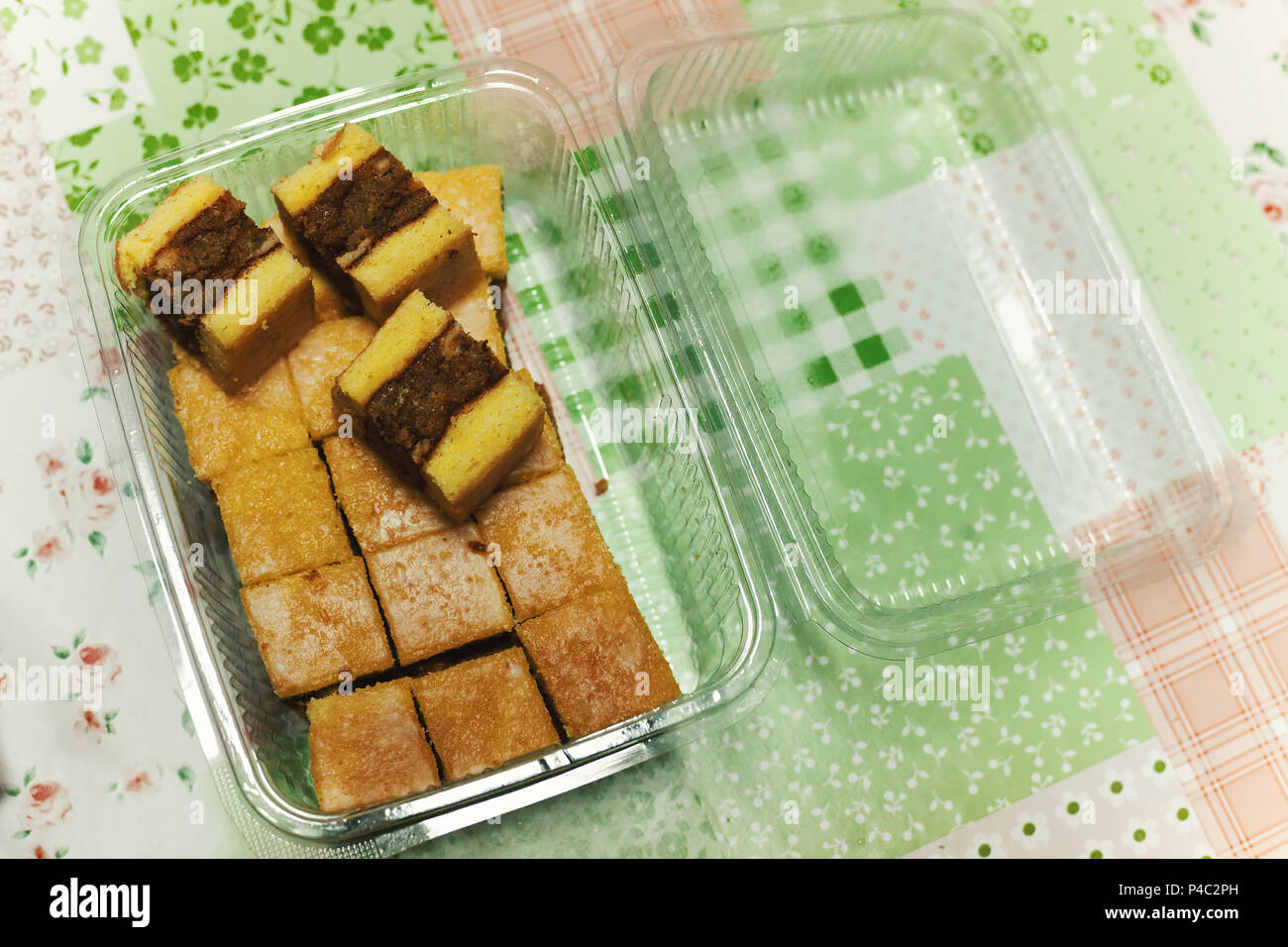 Details of homemade cakes in plastic transparent package Stock Photo ...