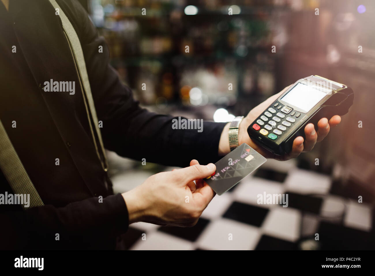 Woman typing credit card code hi-res stock photography and images - Alamy