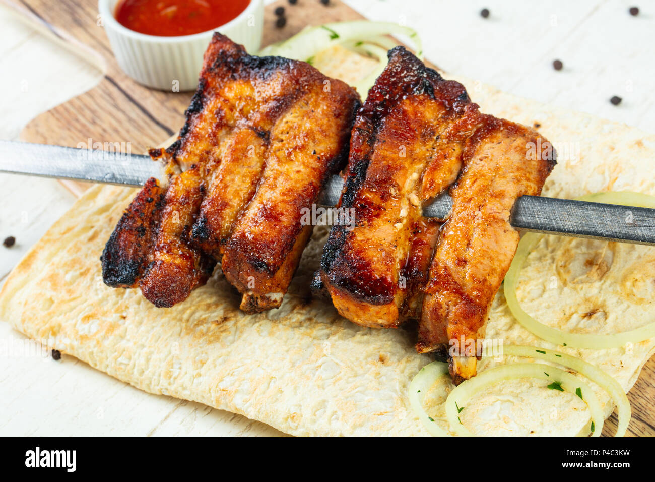 Grilled pork ribs skewer kebab Stock Photo - Alamy