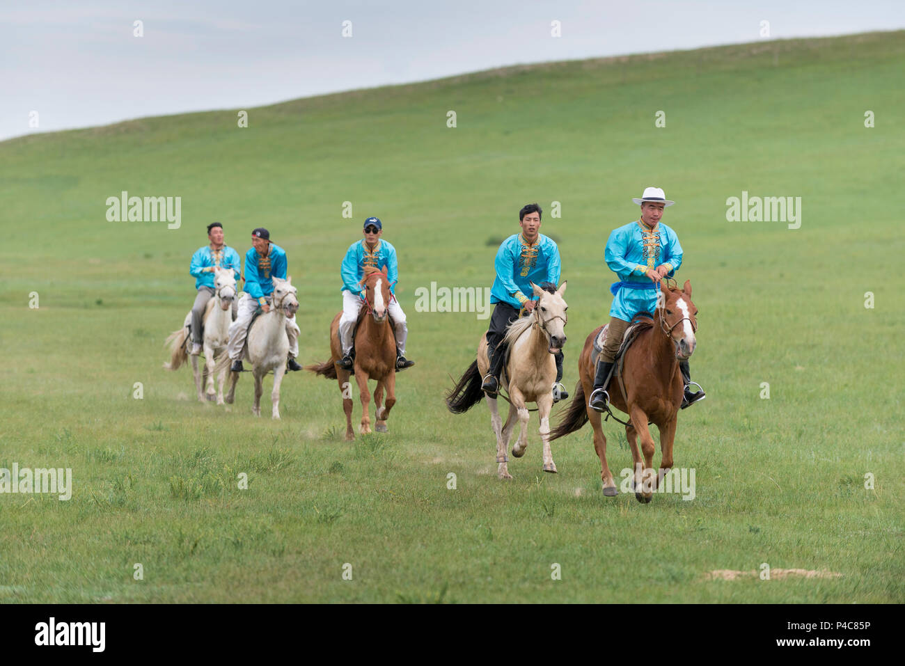Young horsemen demonstrate team riding, Zhenglanqi Wuyi Farm, Inner ...