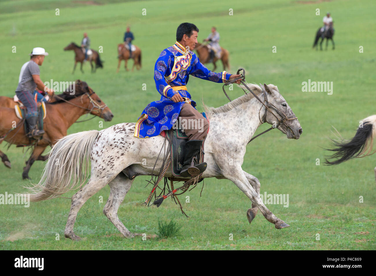 Young horsemen demonstrate team riding, Zhenglanqi Wuyi Farm, Inner ...