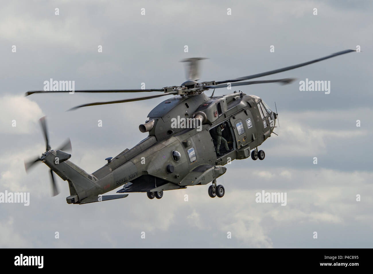 A British Royal Navy Agusta Westland Merlin HC3 helicopter in flight at ...