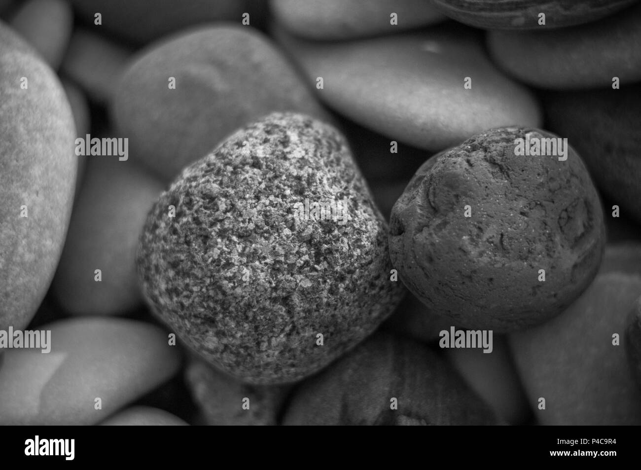 boulders and colorful pebbles on the beach on a warm summer day Stock ...