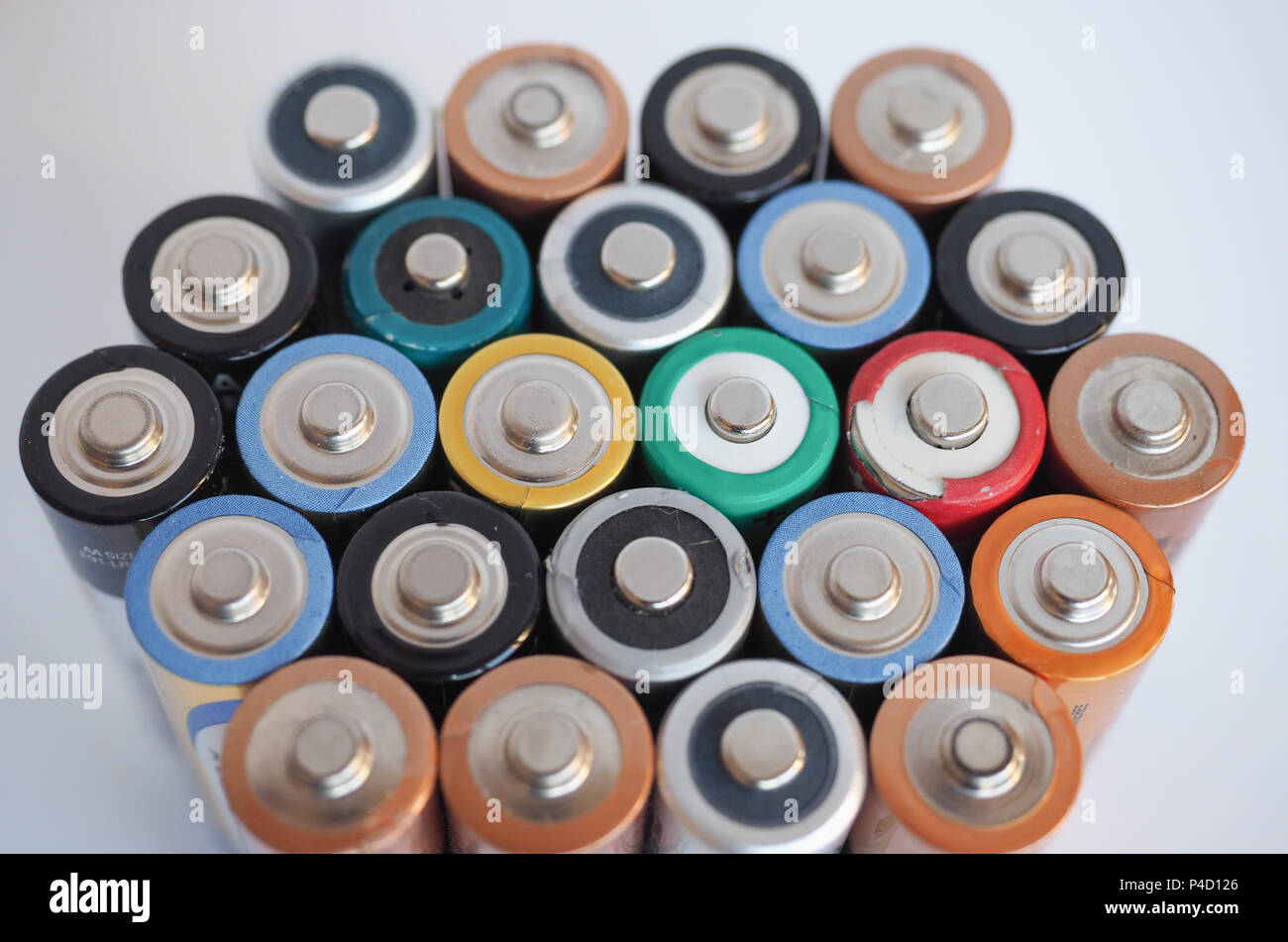 Many AA batteries (aka Double A) for electronic devices Stock Photo - Alamy