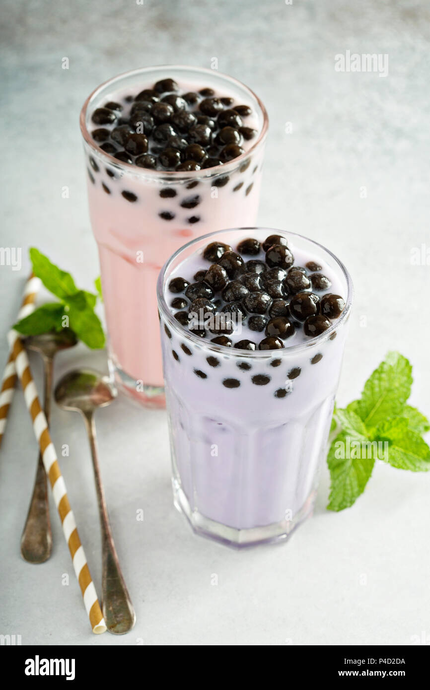 Taro and strawberry milk bubble tea in tall glasses Stock Photo - Alamy