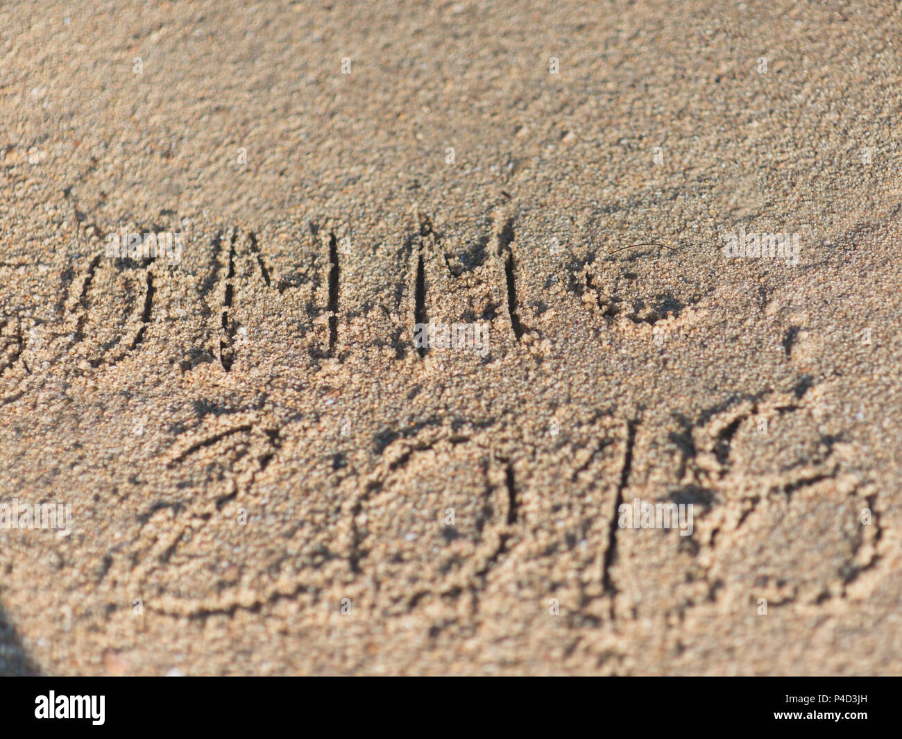 Handwritten message on the sand on a beach near the water Stock Photo ...