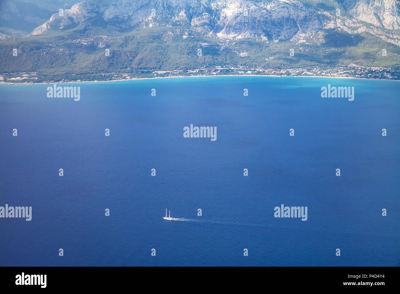 Aerial view of small boat flowing in sea, travel and vacation concept ...