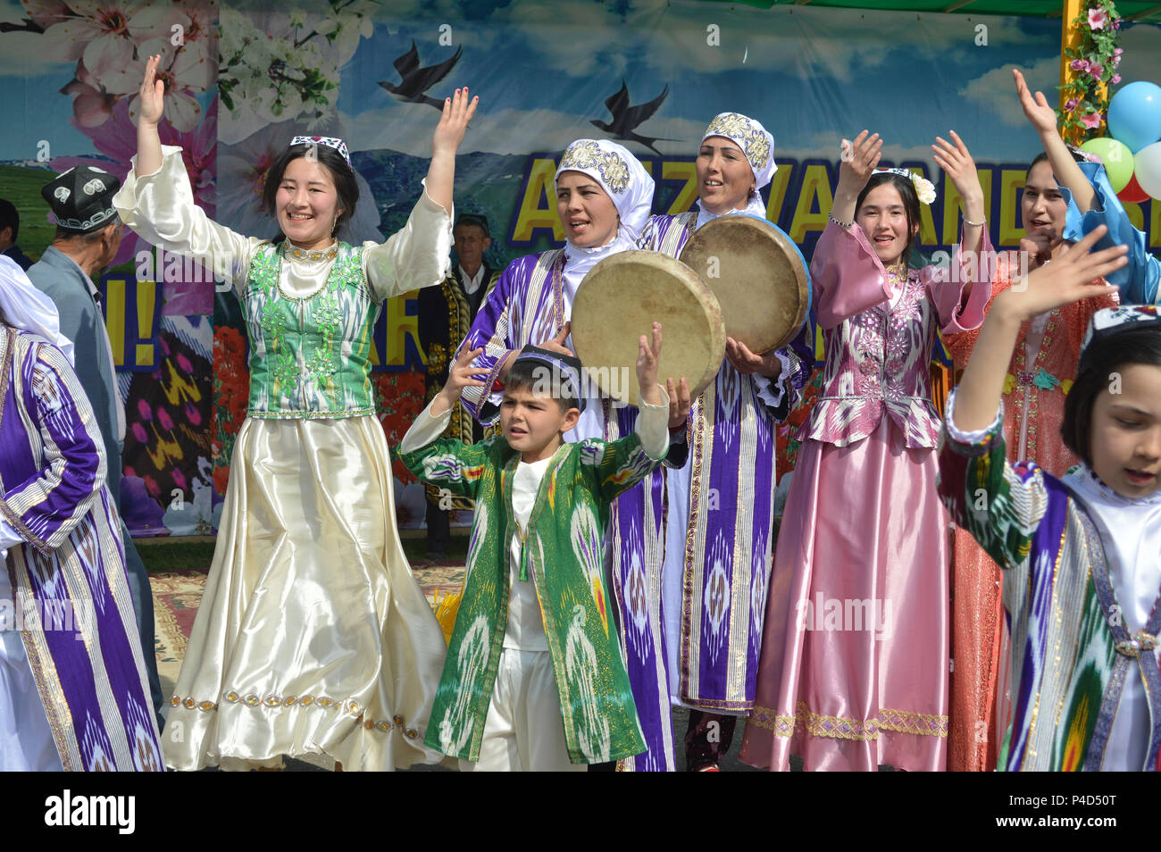 Jizzakh.Uzbekistan.March 2018. Holiday Navruz.People in national cloth ...