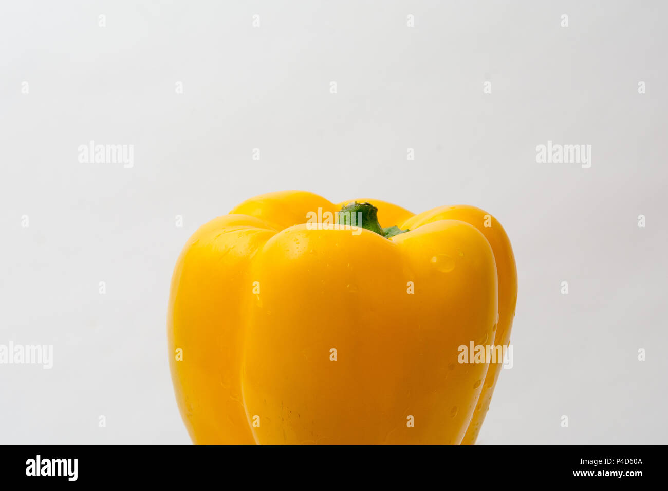 Whole fresh yellow pepper vegetable isolated on white Stock Photo - Alamy