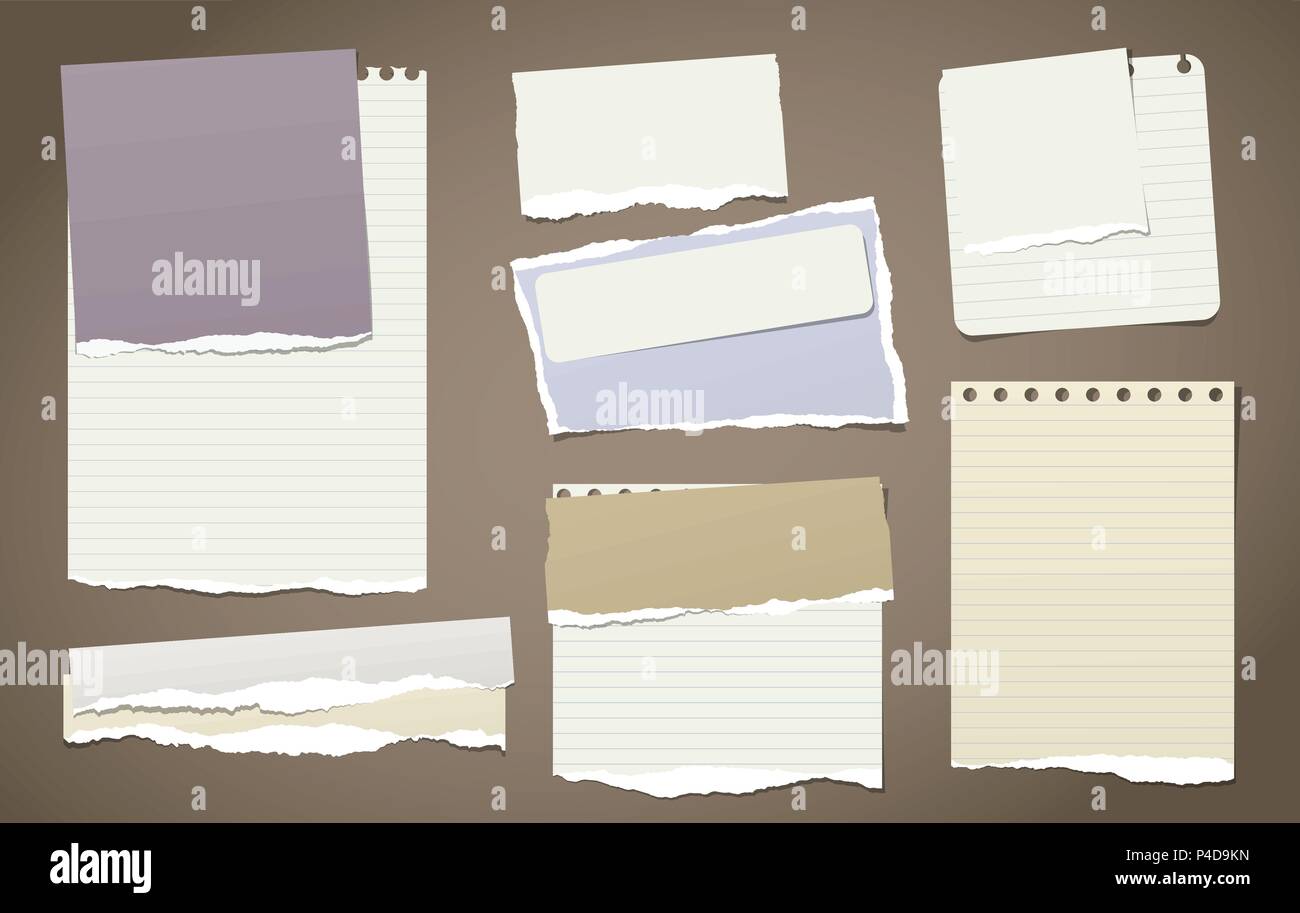 Colorful and white note, notebook paper pieces with torn edges stuck on ...