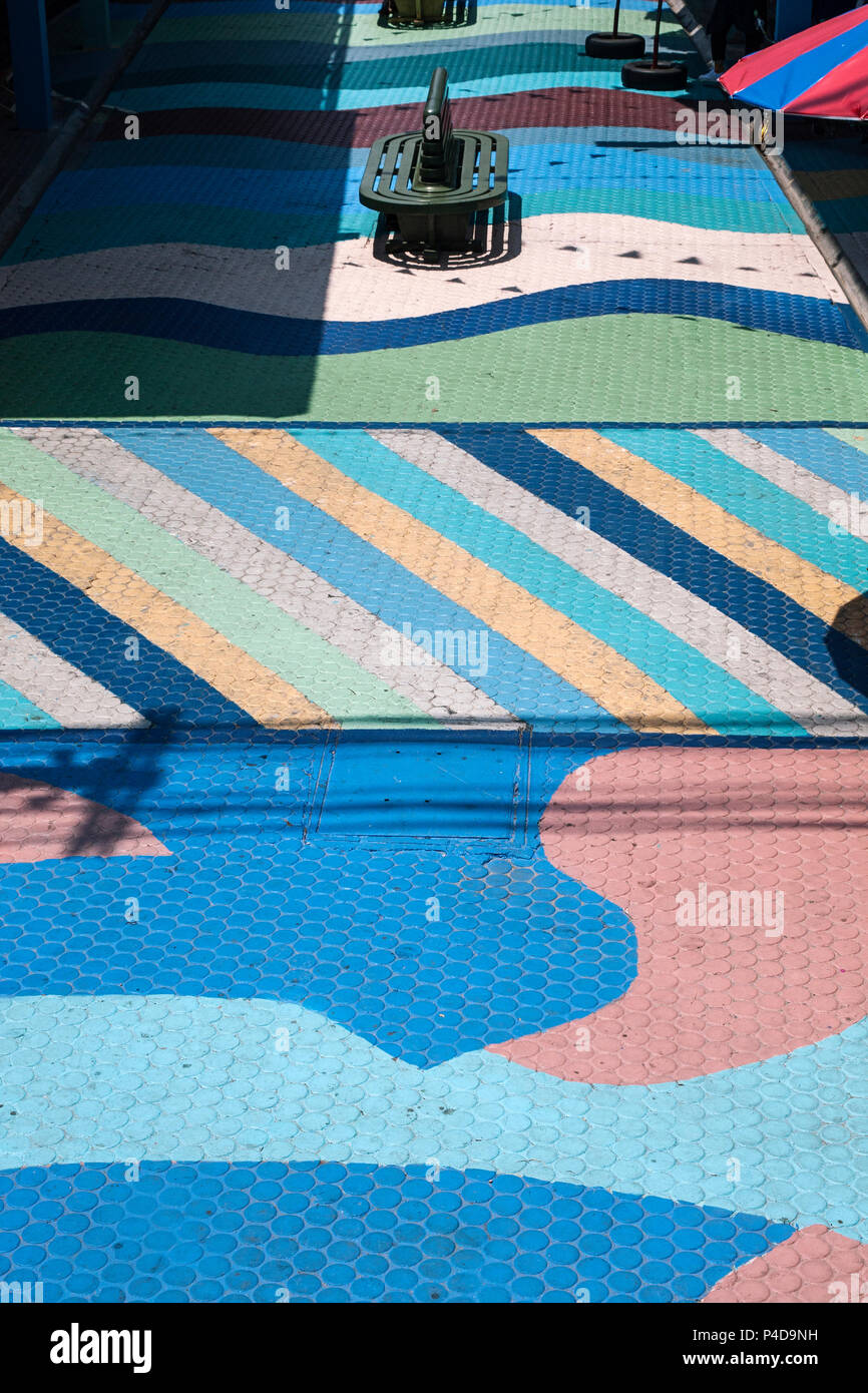 painted colorful sidewalk floor urban sunny day Stock Photo - Alamy