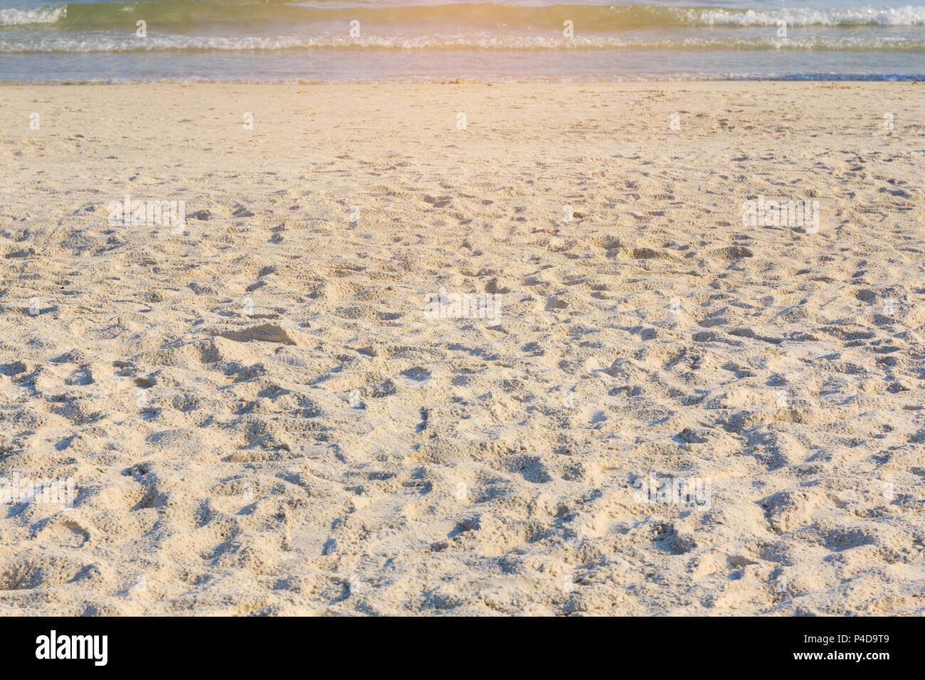 Sand sea texture on the beach background Stock Photo - Alamy