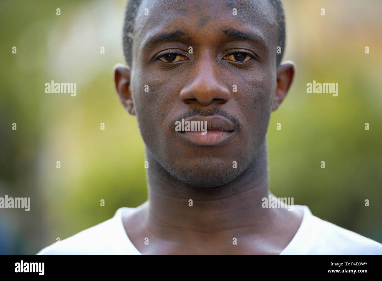 Young African man in the streets outdoors Stock Photo - Alamy