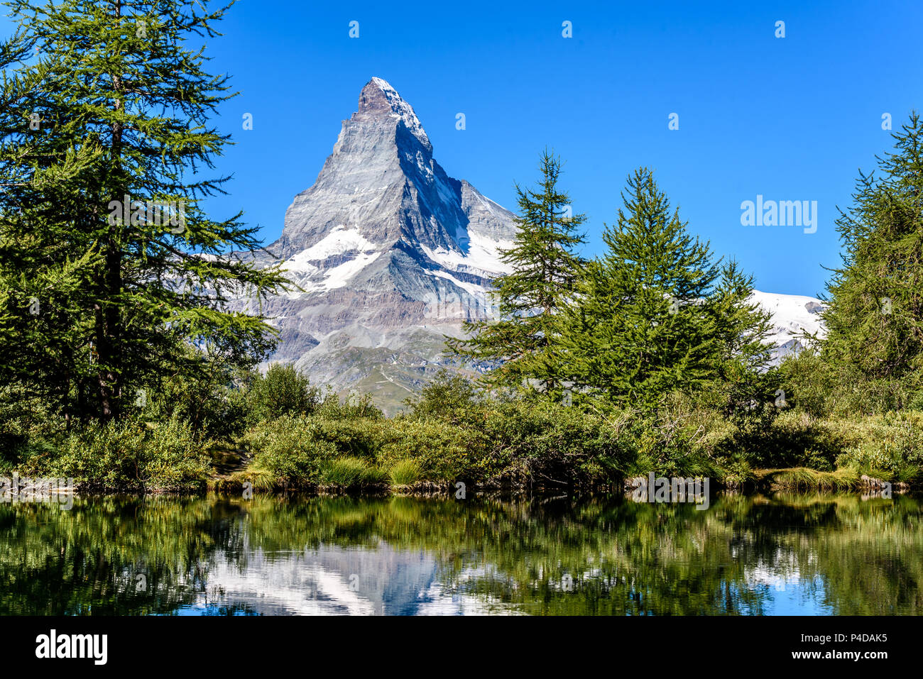 Grindjisee - beautiful lake with reflection of Matterhorn at Zermatt ...