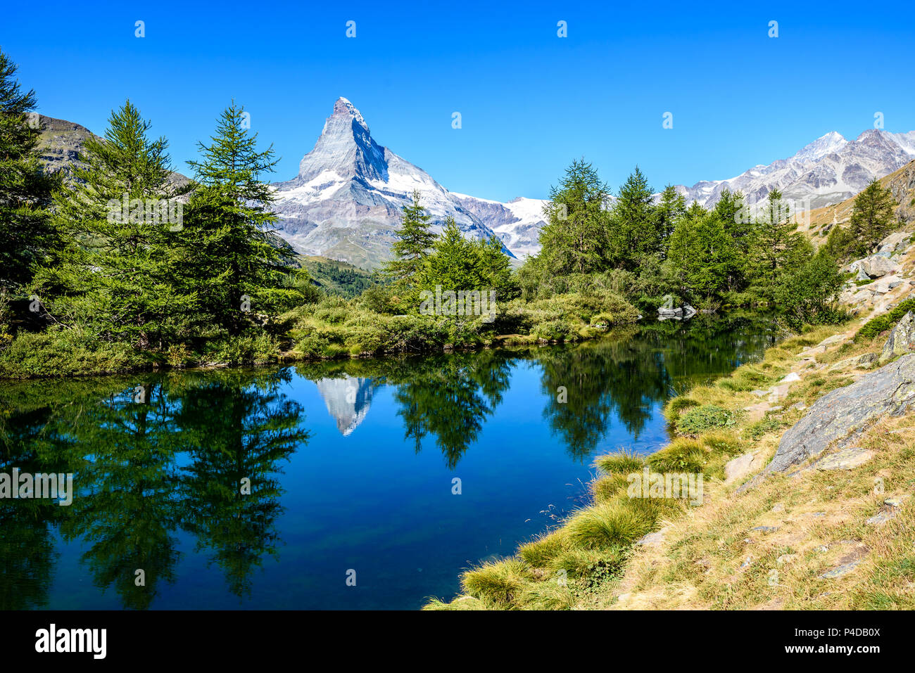 Grindjisee - beautiful lake with reflection of Matterhorn at Zermatt ...